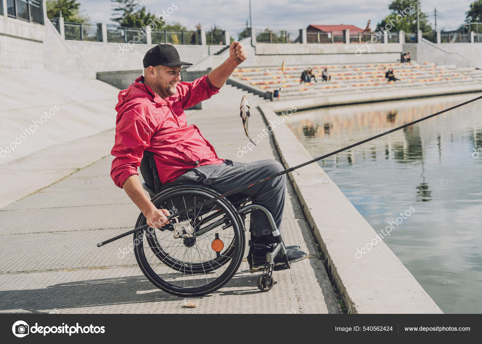 Person with a physical disability who uses wheelchair fishing from ...