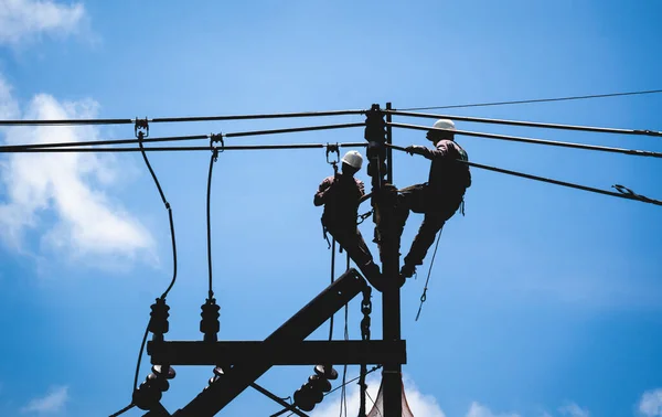 Lineman on pole Stock Photos, Royalty Free Lineman on pole Images ...