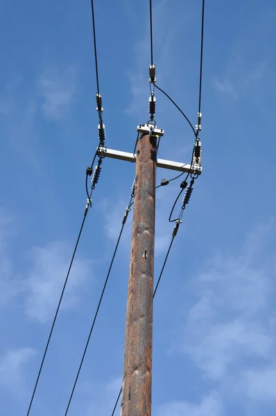 Wooden electric pole with power line — Stock Photo © Zetor2010 #35470111
