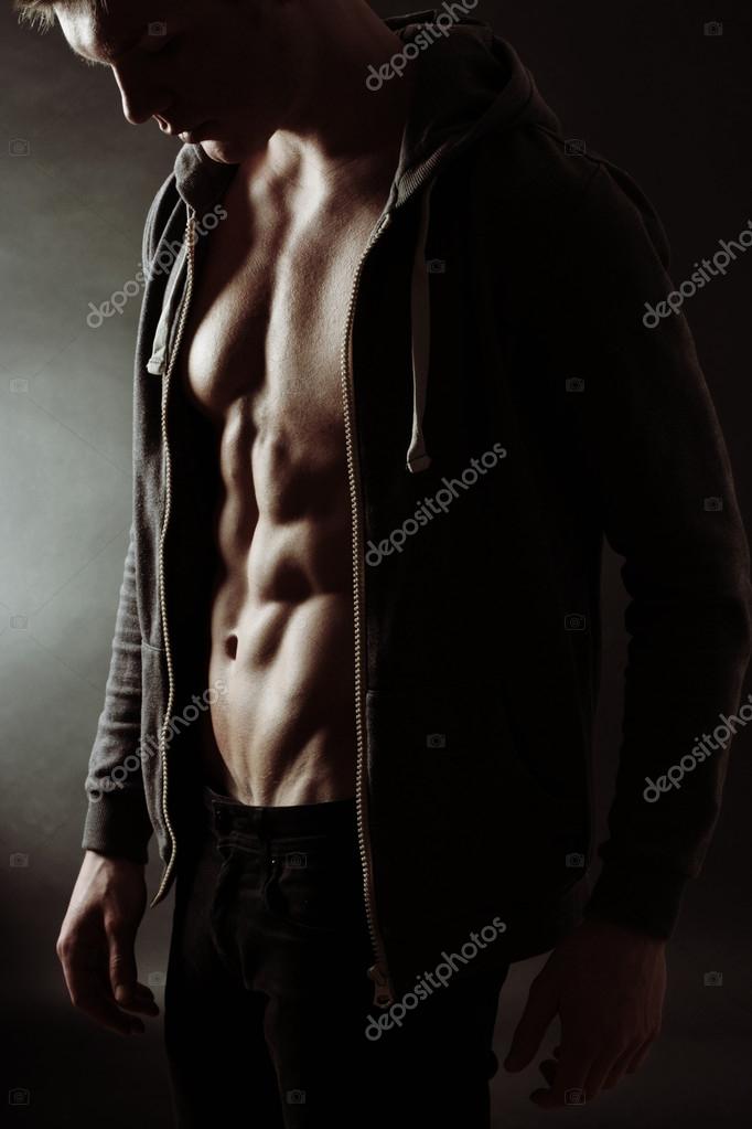 Silhouette of a fit man in a jacket Stock Photo by ©peachy 38924609