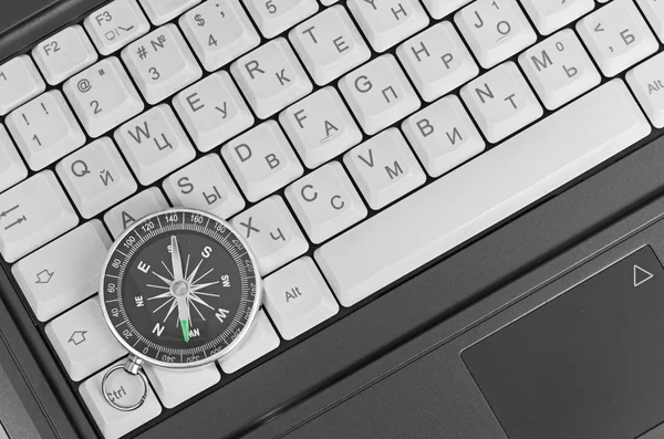 Computer keyboard and retro compass — Stock Photo © merznatalia #15793201