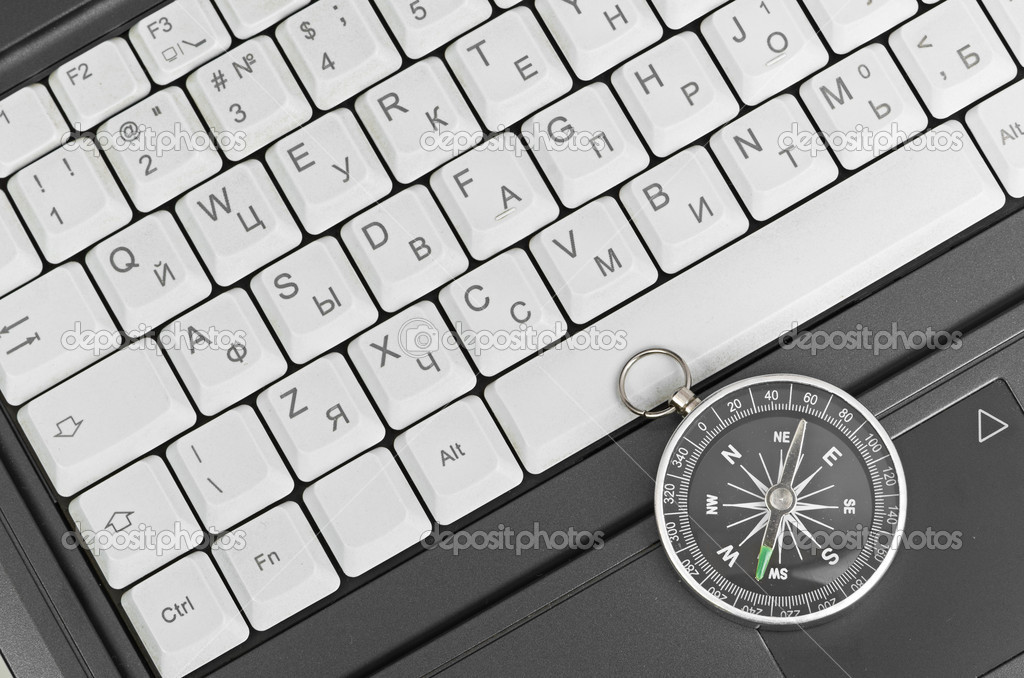Computer keyboard and retro compass — Stock Photo © merznatalia #15793201
