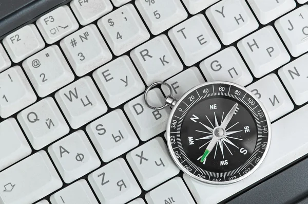 Computer keyboard and retro compass — Stock Photo © merznatalia #15793201