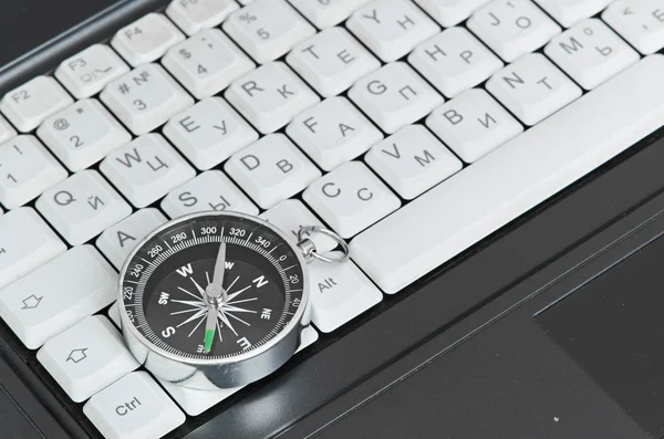 Computer keyboard and retro compass — Stock Photo © merznatalia #18372375