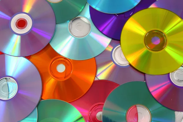 Color CD and DVD background Stock Photo by ©jonnysek 42209591