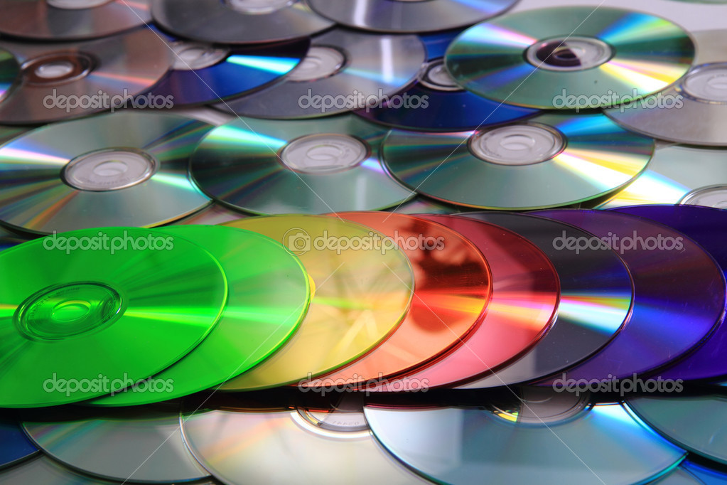 Color CD and DVD background Stock Photo by ©jonnysek 42209591