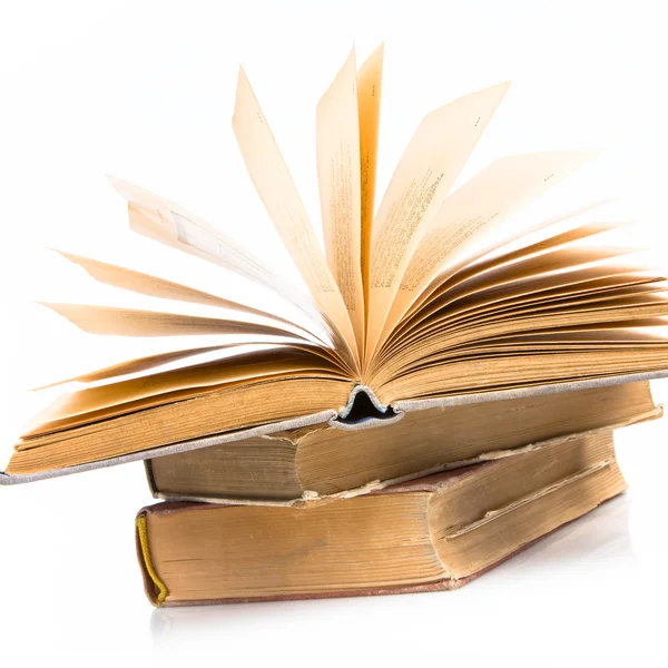Old books piled together over white background — Stock Photo © 06photo ...