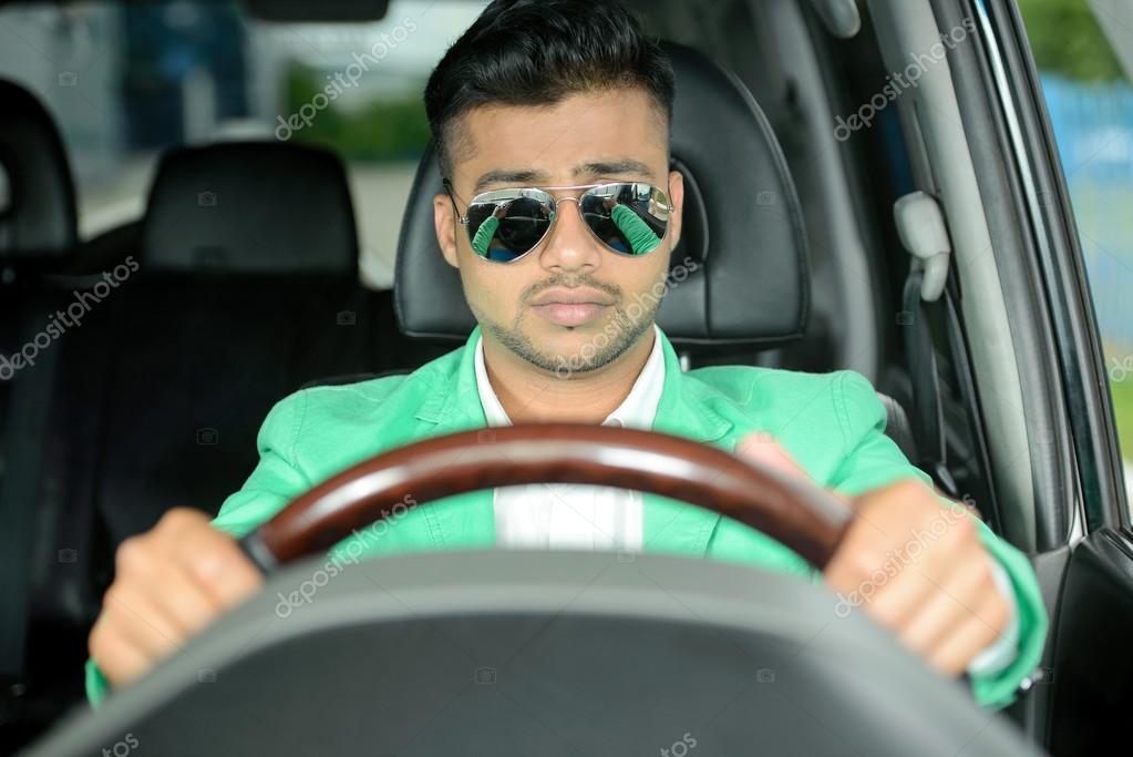 Indian Man Driving Car