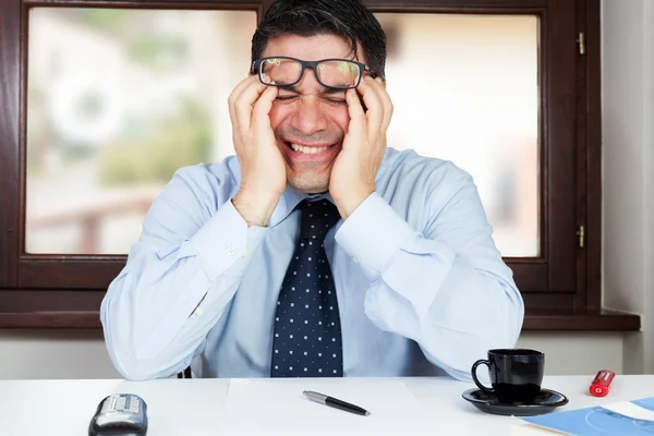 Desperate man in the office — Stock Photo © drizzuti #46138865