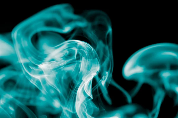 Humo de turquesa fotos de stock, imágenes de Humo de turquesa sin ...