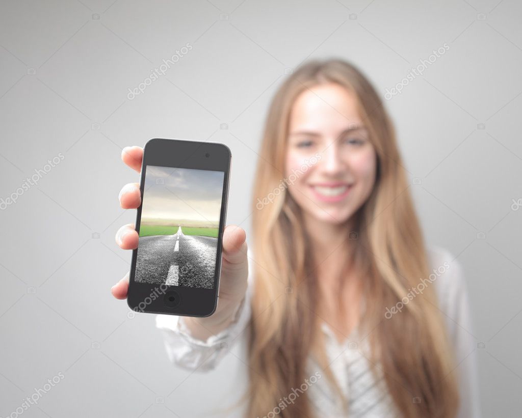 Beautiful woman smiling showing a picture — Stock Photo © olly18 #34890573 Beautiful woman smiling showing a picture — Stock Photo © olly18 #34890573