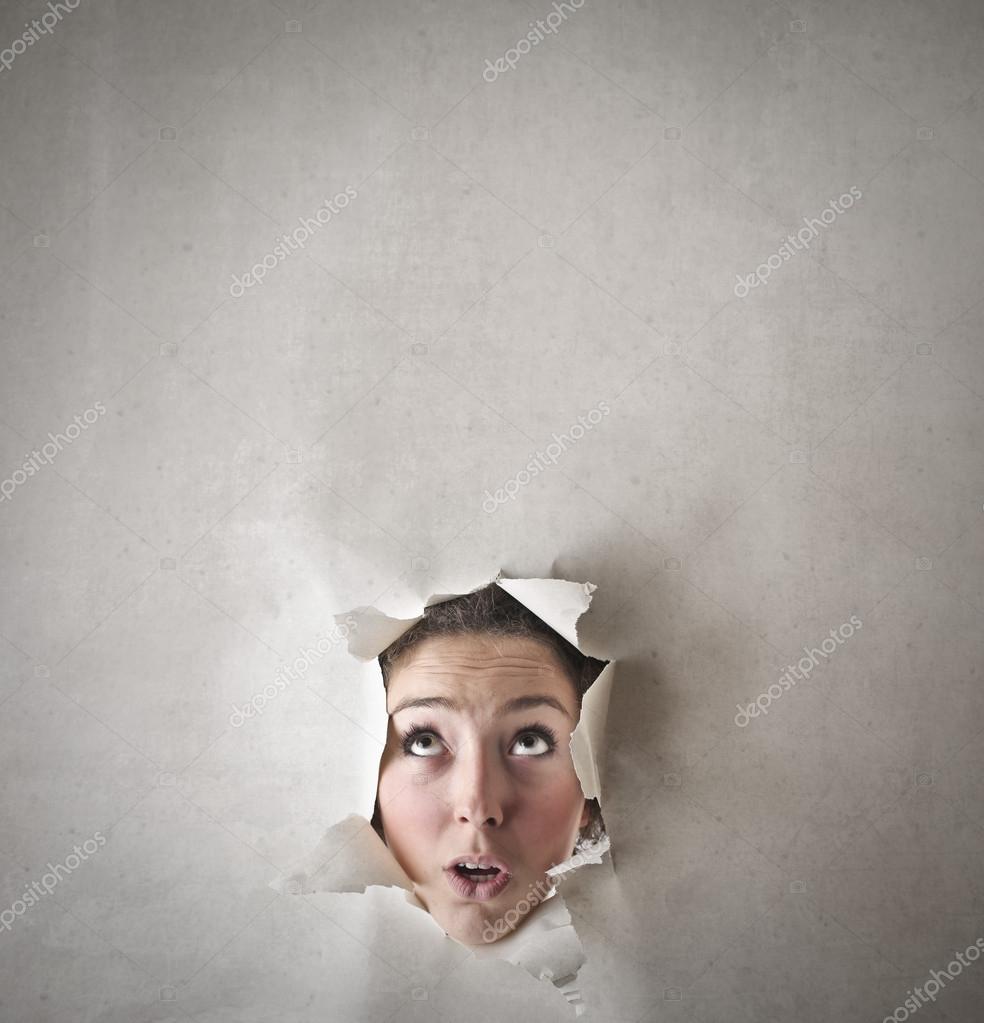 Woman's face into a hole Stock Photo by ©olly18 38982657