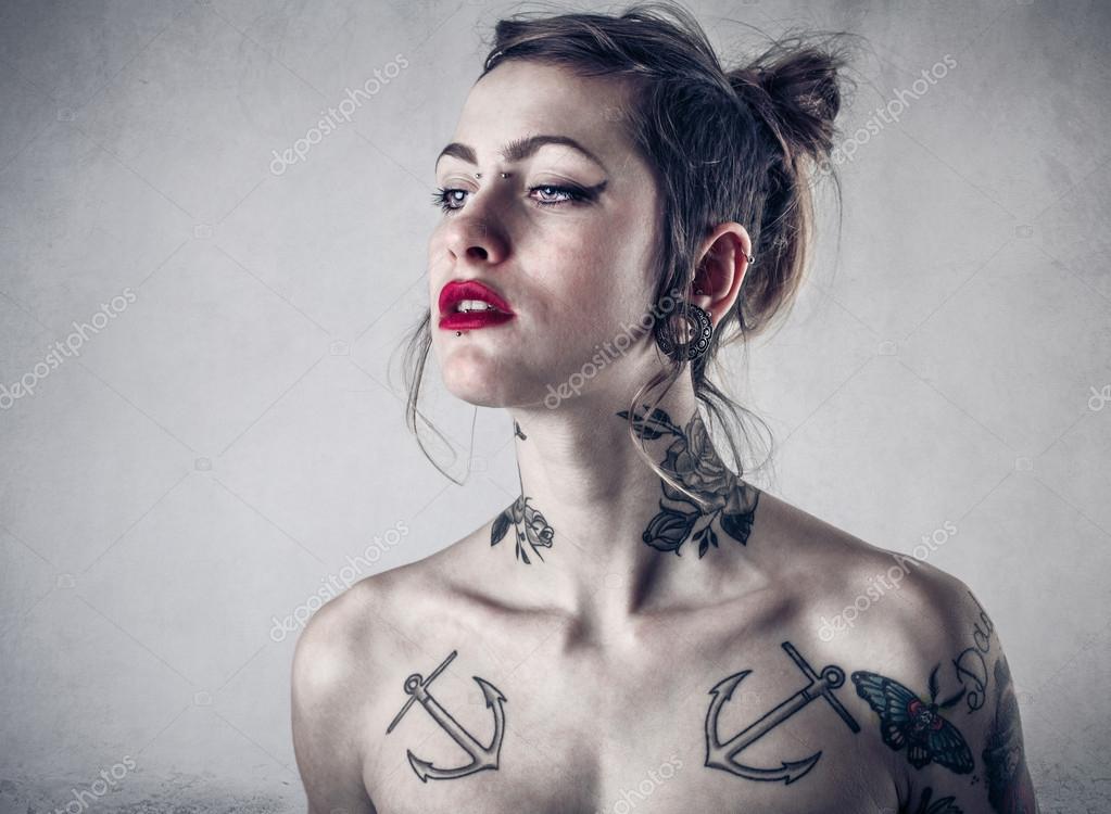 Beautiful alternative woman with tatoos — Stock Photo © olly18 #40641313 Beautiful alternative woman with tatoos — Stock Photo © olly18 #40641313