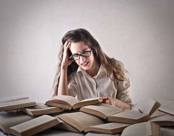 Desperate young woman studying - Stock Image - Everypixel