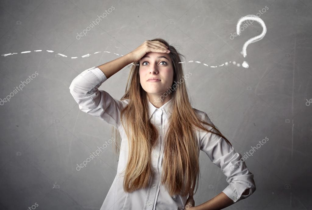 Young woman rememebering something — Stock Photo © olly18 #43961105