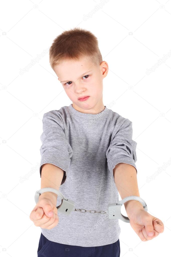 Boy with handcuffs Stock Photo by ©lanych 18599061