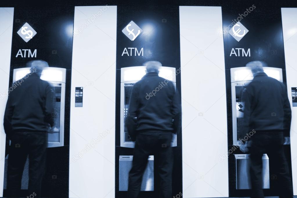 Men Using ATM Machines Stock Photo by ©newlight 12481966
