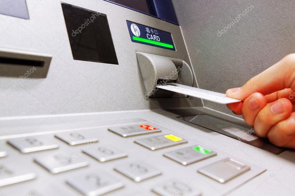 Insert card in ATM machine — Stock Photo © cozyta #33584081