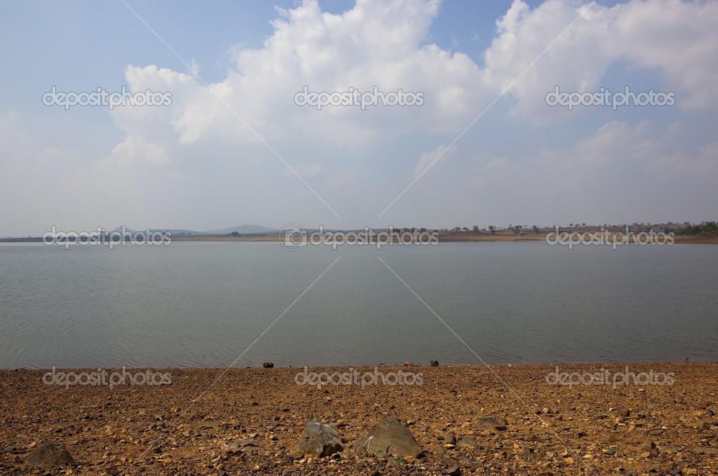 Clouds over kabini river — Stock Photo © emjaysmith #42665143