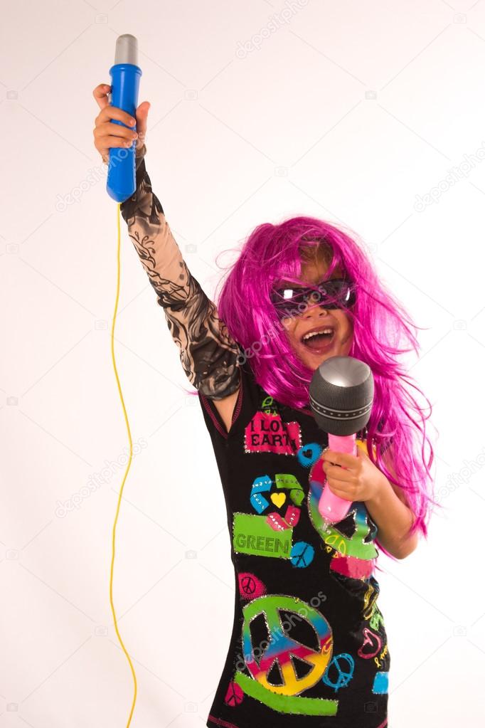 Beautiful Rock Star Girl Singing — Stock Photo © herjua #26376371