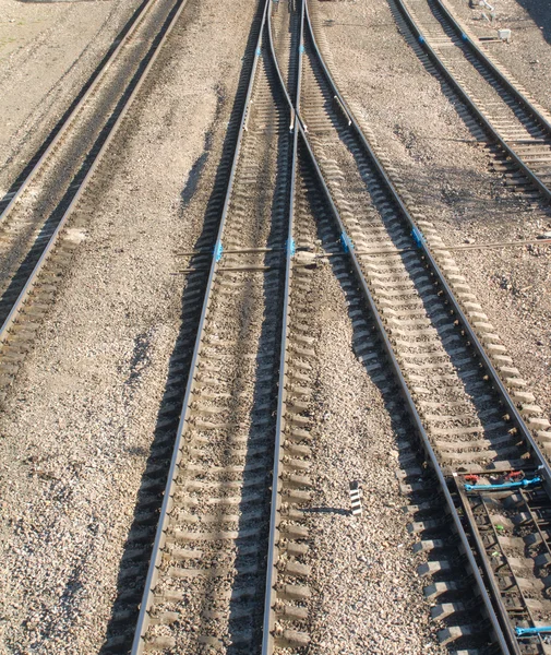 Merging railroad tracks. Stock Photo by ©eevl 117751960