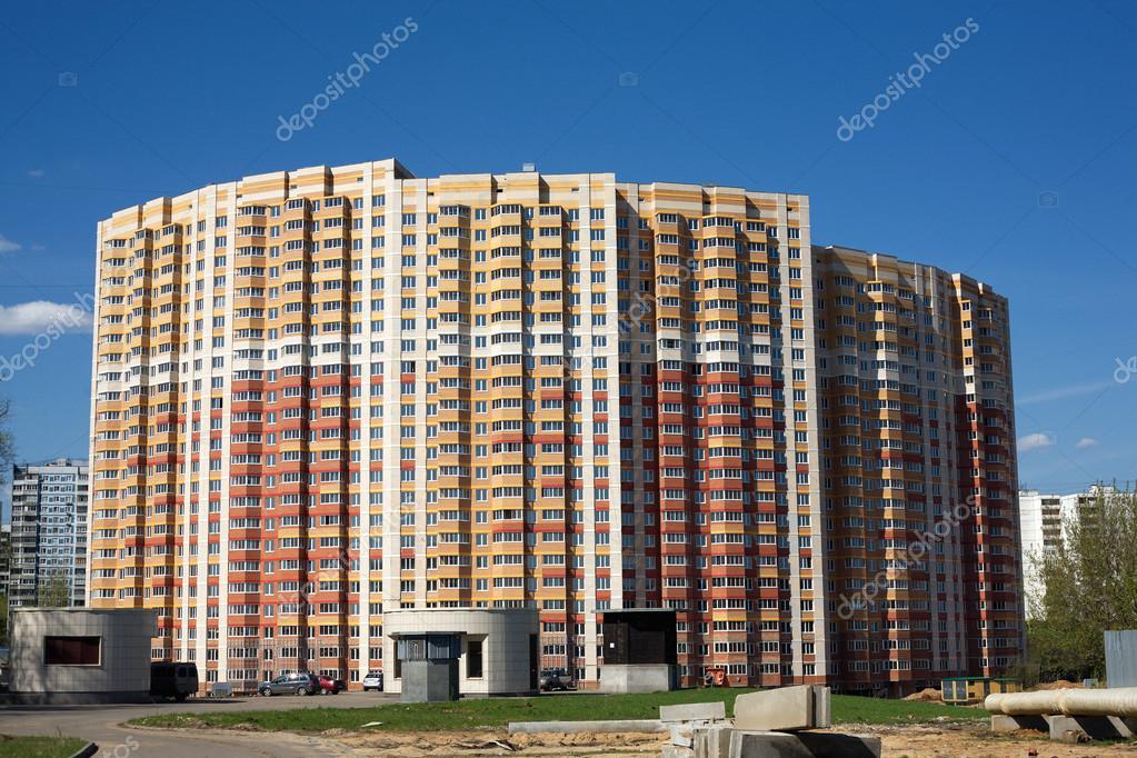 Front view of new modern multistoried residential brick building Stock ...