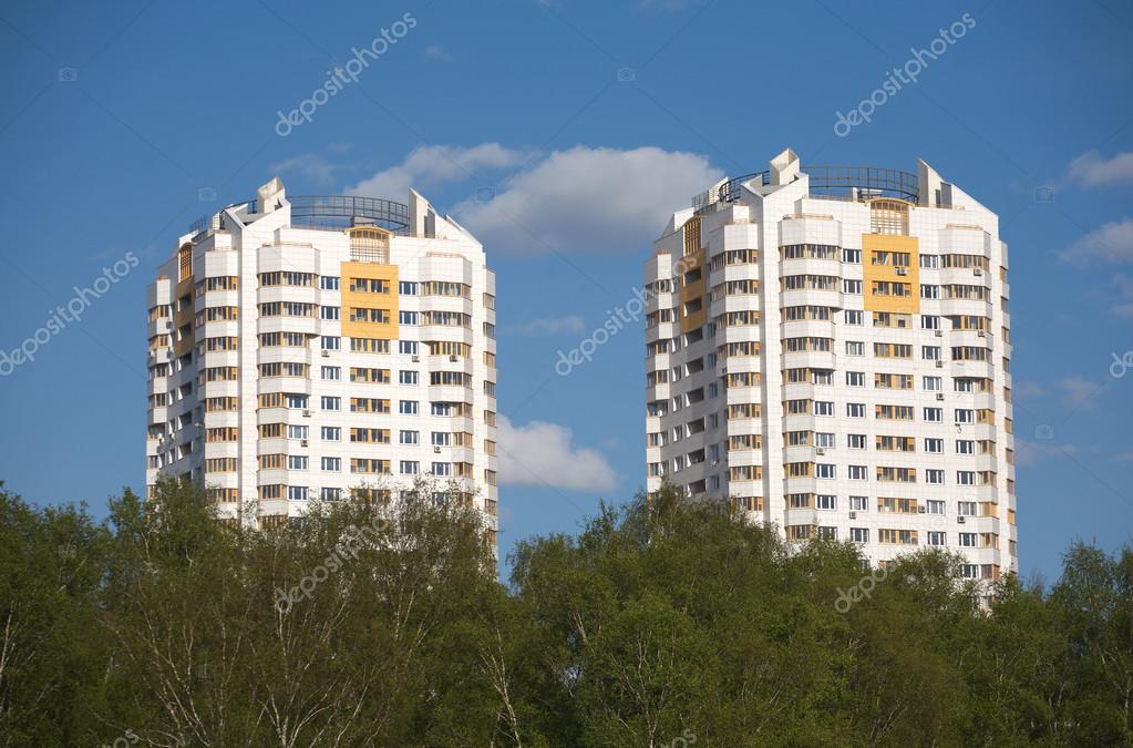 Two constructed multistory residential buildings in ecological place ...