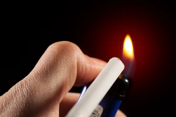 Someone lighting a cigarette Stock Photo by ©Wavebreakmedia 14146427