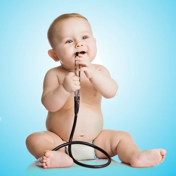 Sweet baby with stethoscope on a white background. Adorable baby Stock ...