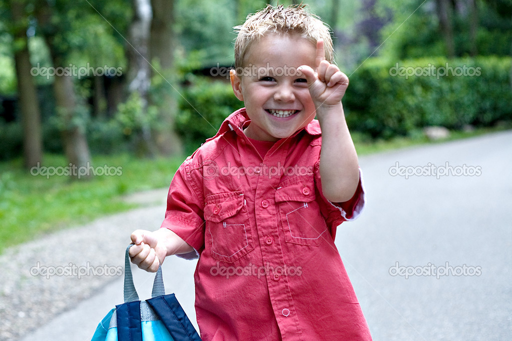 Kid making a little sign Stock Photo by ©dnf-style 12672811