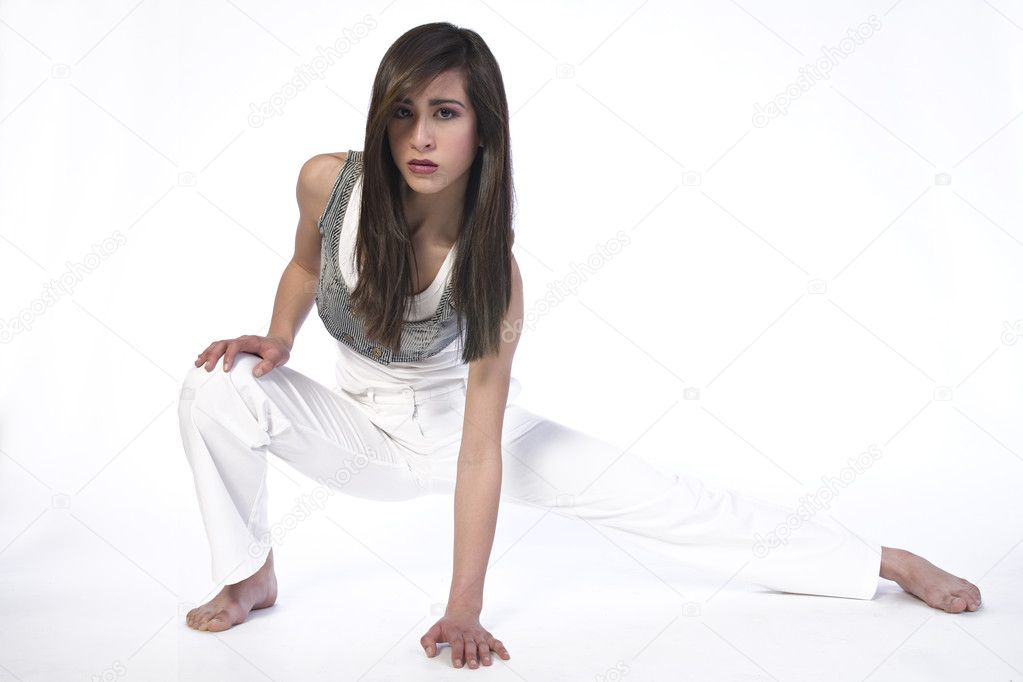 Mixed raced young beauty in full stretch — Stock Photo © dnf-style ...