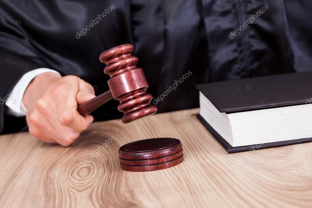 Male Judge In A Courtroom — Stock Photo © AndreyPopov #13241854