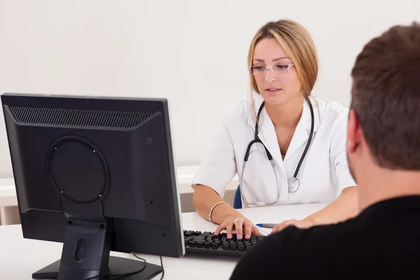 Physician explains the procedure Stock Photo by ©AndreyPopov 15717183