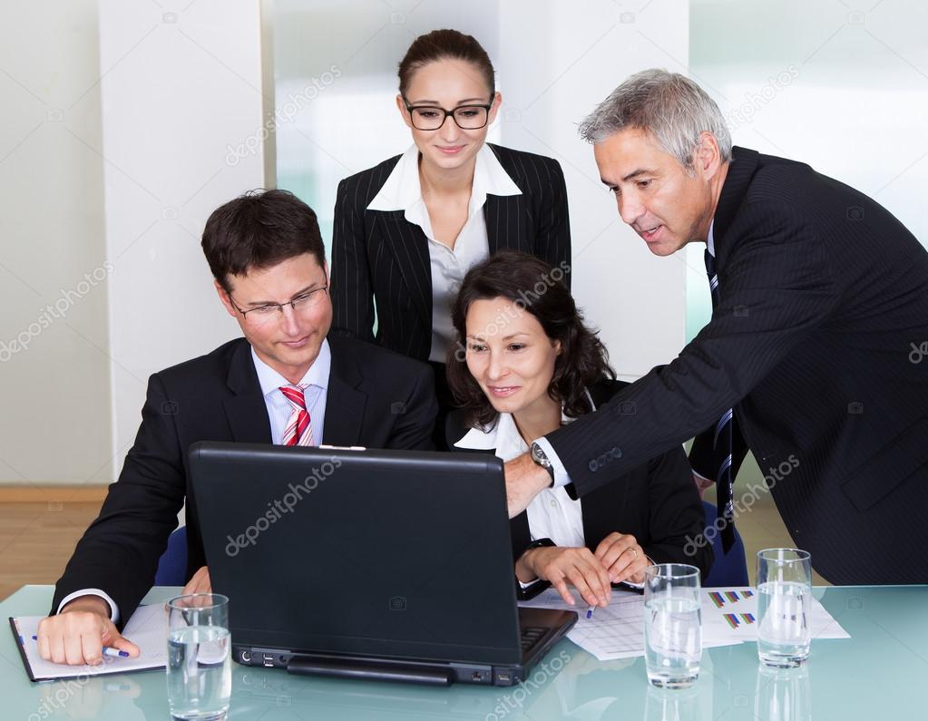 Businesspeople having a discussion — Stock Photo © AndreyPopov #18597389 Businesspeople having a discussion — Stock Photo © AndreyPopov #18597389