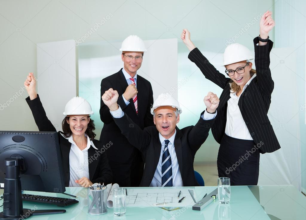 Cheering architectural team Stock Photo by ©AndreyPopov 18597505
