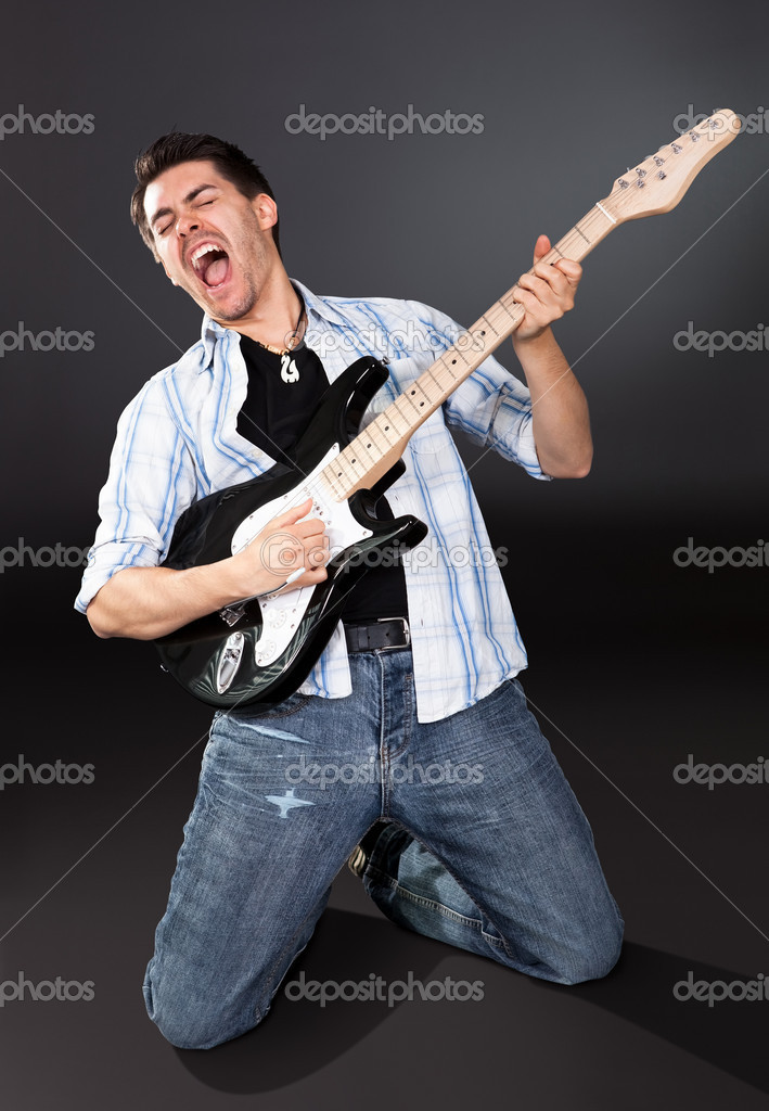 Singer with guitar Stock Photo by ©AndreyPopov 18927045