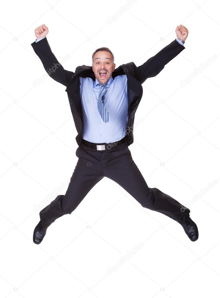 Businessman Jumping In Joy — Stock Photo © AndreyPopov #19607317