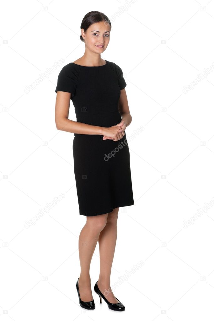 Beautiful young woman standing on white background Stock Photo by ...