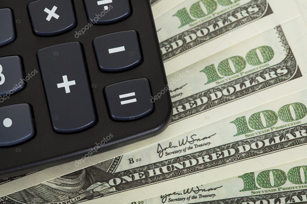 Closeup on calculator and dollars — Stock Photo © AndreyPopov #21727725