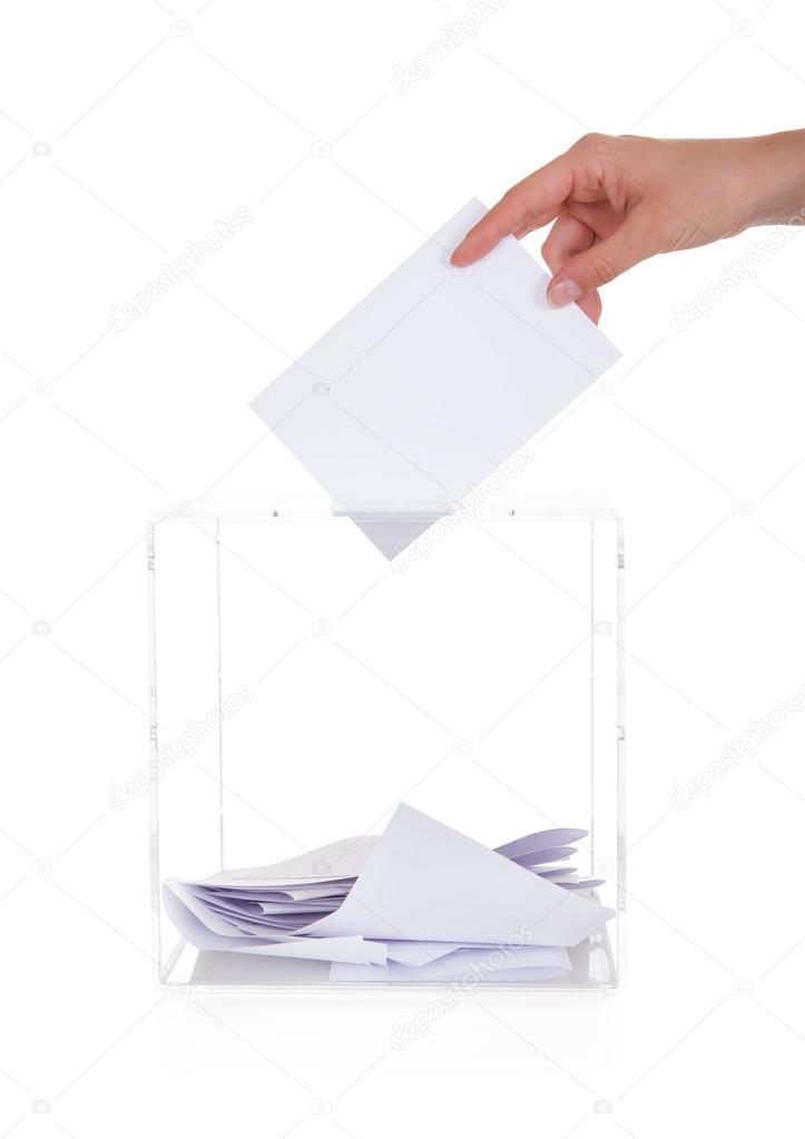 Closeup Of Hand Inserting Ballot In Box Stock Photo by ©AndreyPopov ...