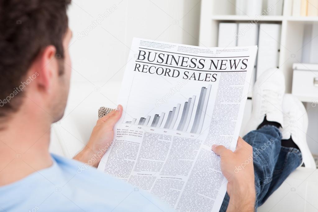 Young Man Reading Newspaper Stock Photo by ©AndreyPopov 35016039 Young Man Reading Newspaper Stock Photo by ©AndreyPopov 35016039