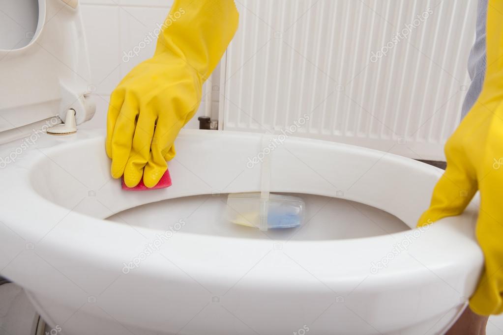 Person's Hand Cleaning Toilet Stock Photo by ©AndreyPopov 37033509