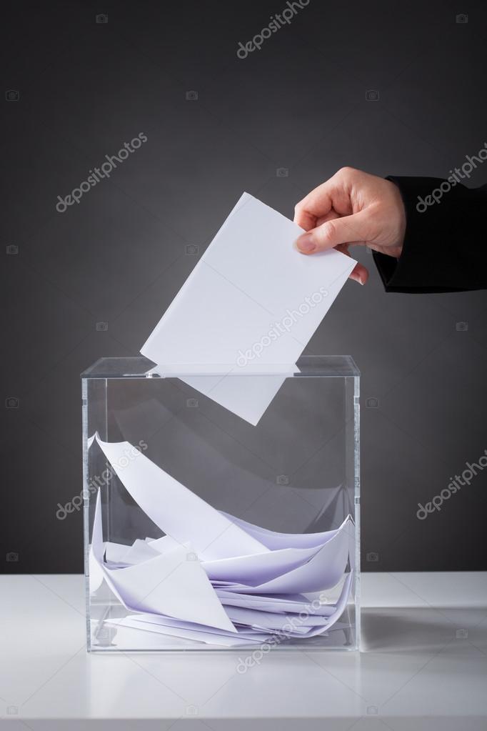 Hand Putting Ballot In Box Stock Photo by ©AndreyPopov 42842583