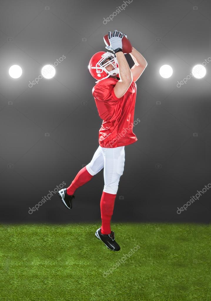 American Football Player Jumping On Field — Stock Photo © AndreyPopov ...