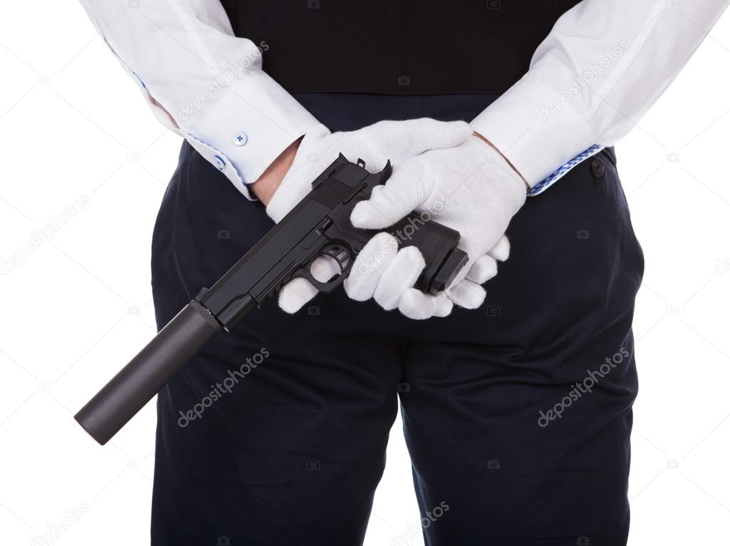 Rear View Of Waiter Holding Handgun — Stock Photo © AndreyPopov #44591727