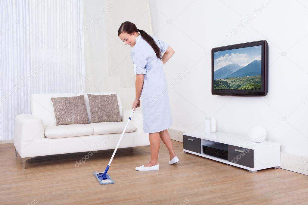 Maid Cleaning Floor With Mop Stock Photo by ©AndreyPopov 45260629