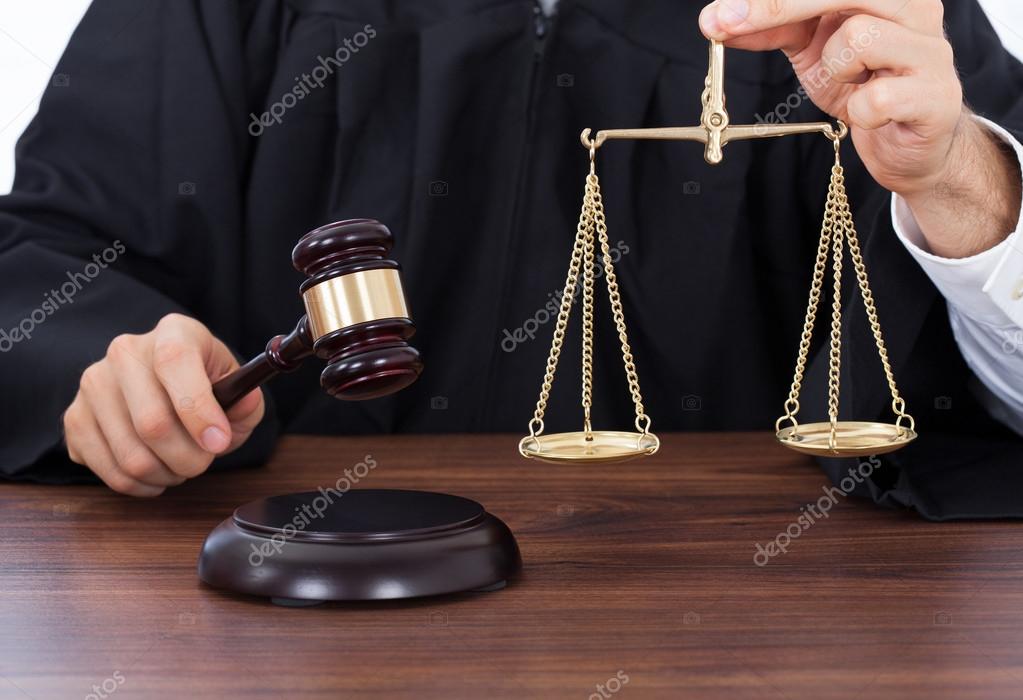 Judge Holding Weight Scale Stock Photo by ©AndreyPopov 48700467