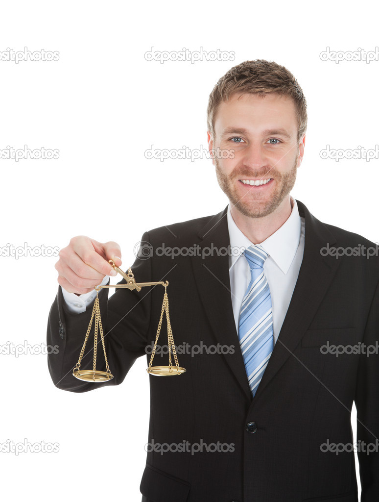 Businessman Holding Scale Stock Photo by ©AndreyPopov 49940381