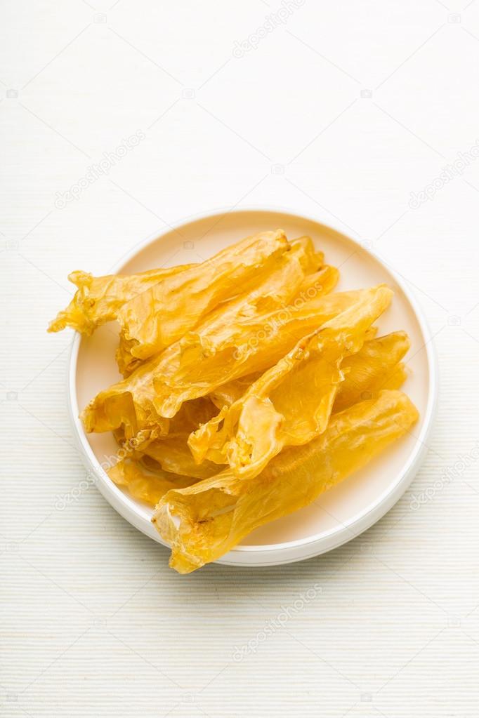 Chinese dried fish maw in the bowl — Stock Photo © leungchopan #35799029