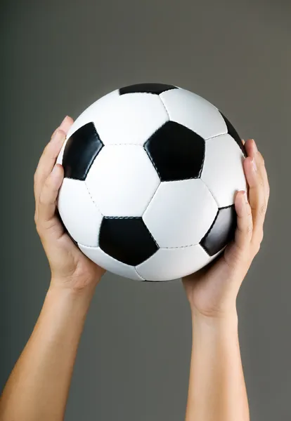 Hand with soccer ball Stock Photo by ©leungchopan 78600828